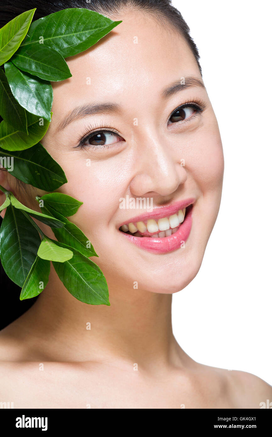 Studio shot young woman's facial expressions Stock Photo - Alamy