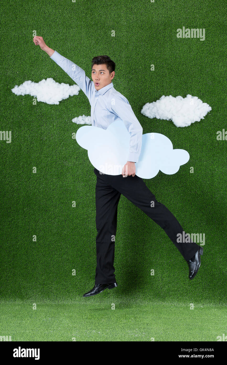 Grassland creative business man Stock Photo - Alamy