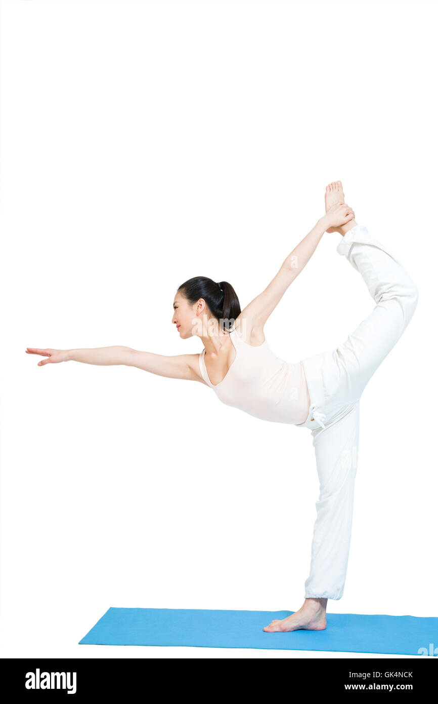 Studio shot Young woman fitness modeling Stock Photo - Alamy