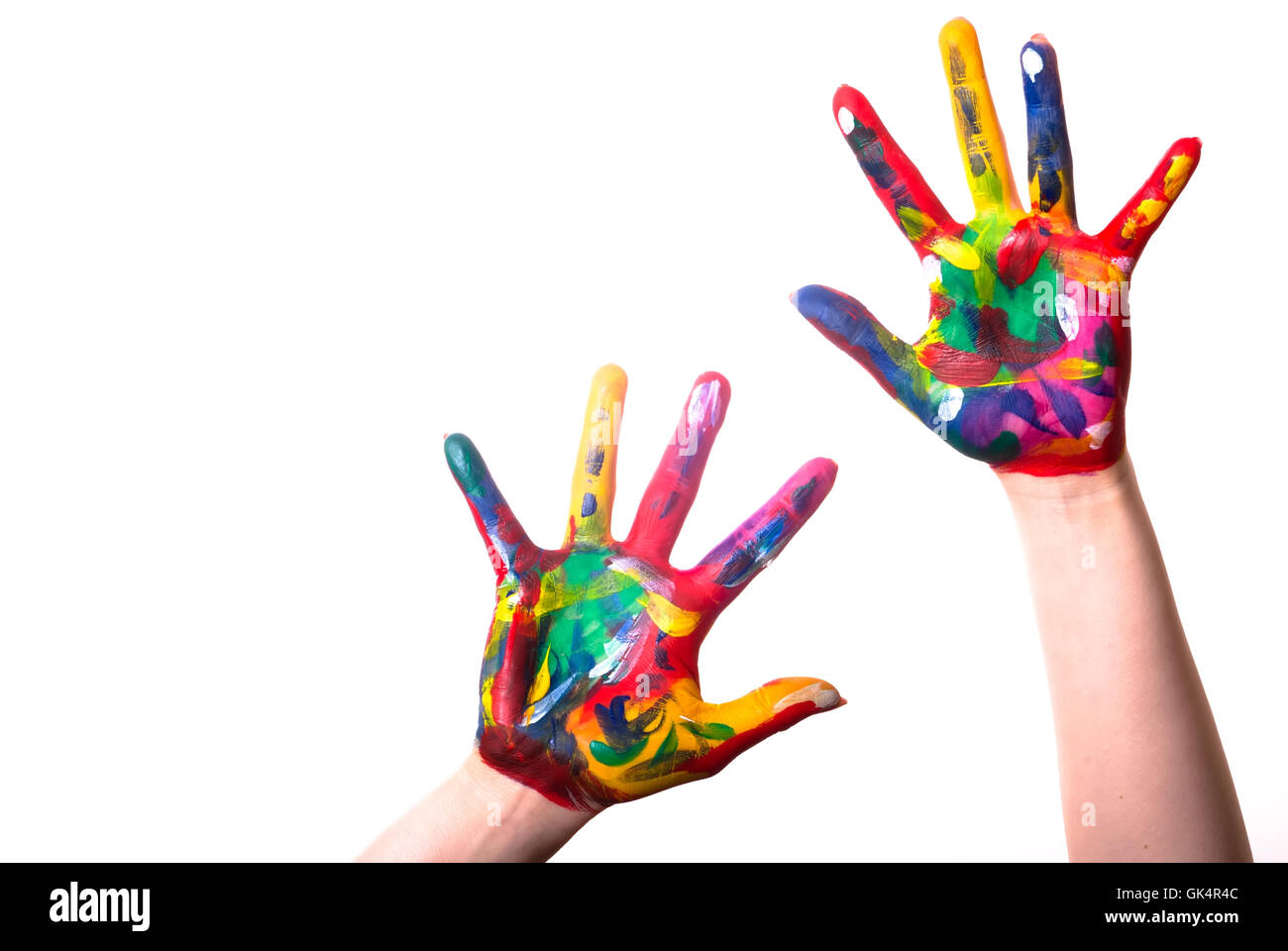 two colorful hands with copy space Stock Photo - Alamy