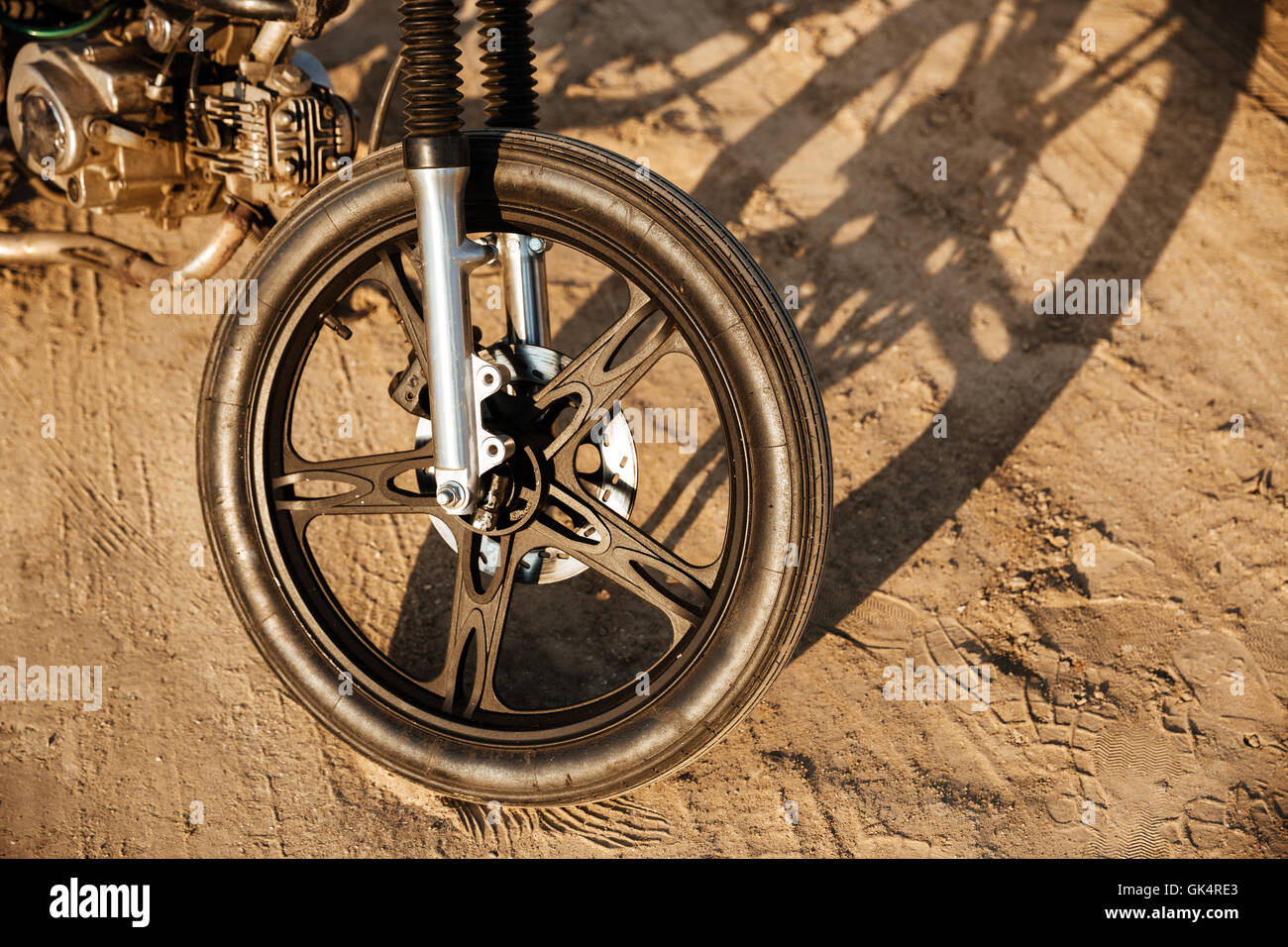 Close up of motorcycle wheel at the desert Stock Photo - Alamy