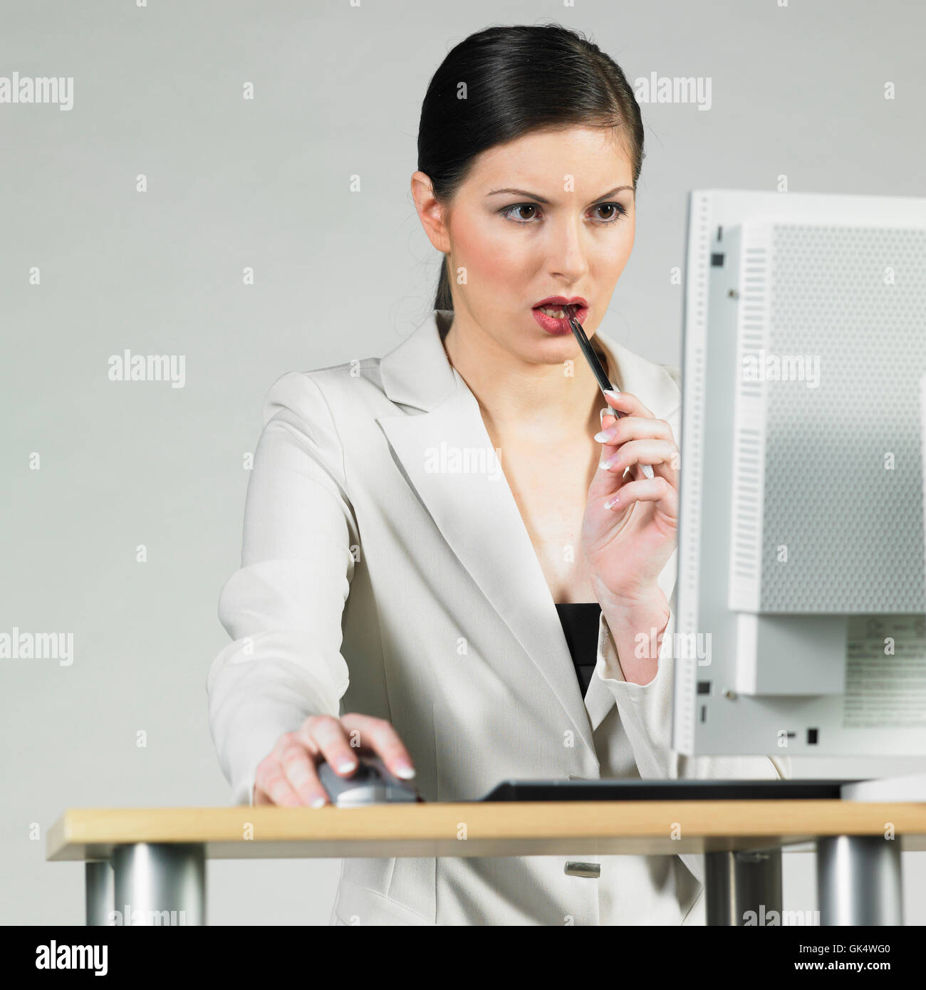 woman woman monitors Stock Photo - Alamy