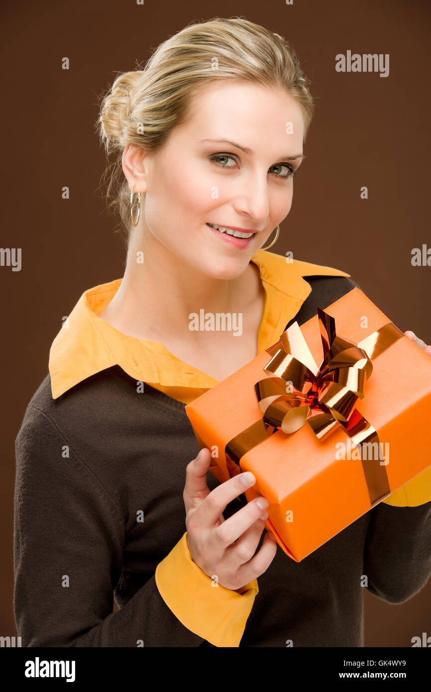 woman present party Stock Photo - Alamy