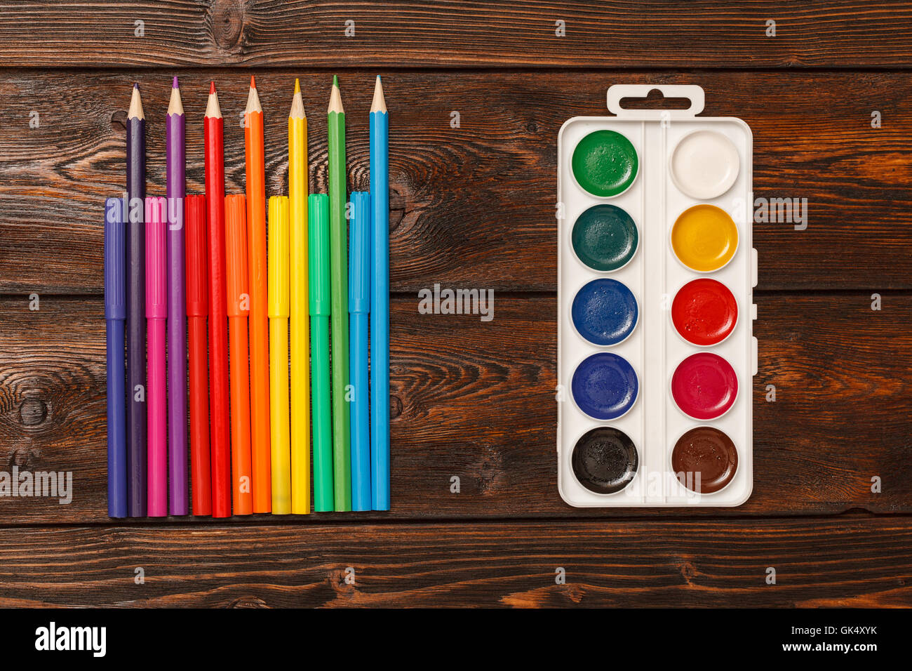 Assorted colors marker pens and pencils with watercolors Stock Photo ...