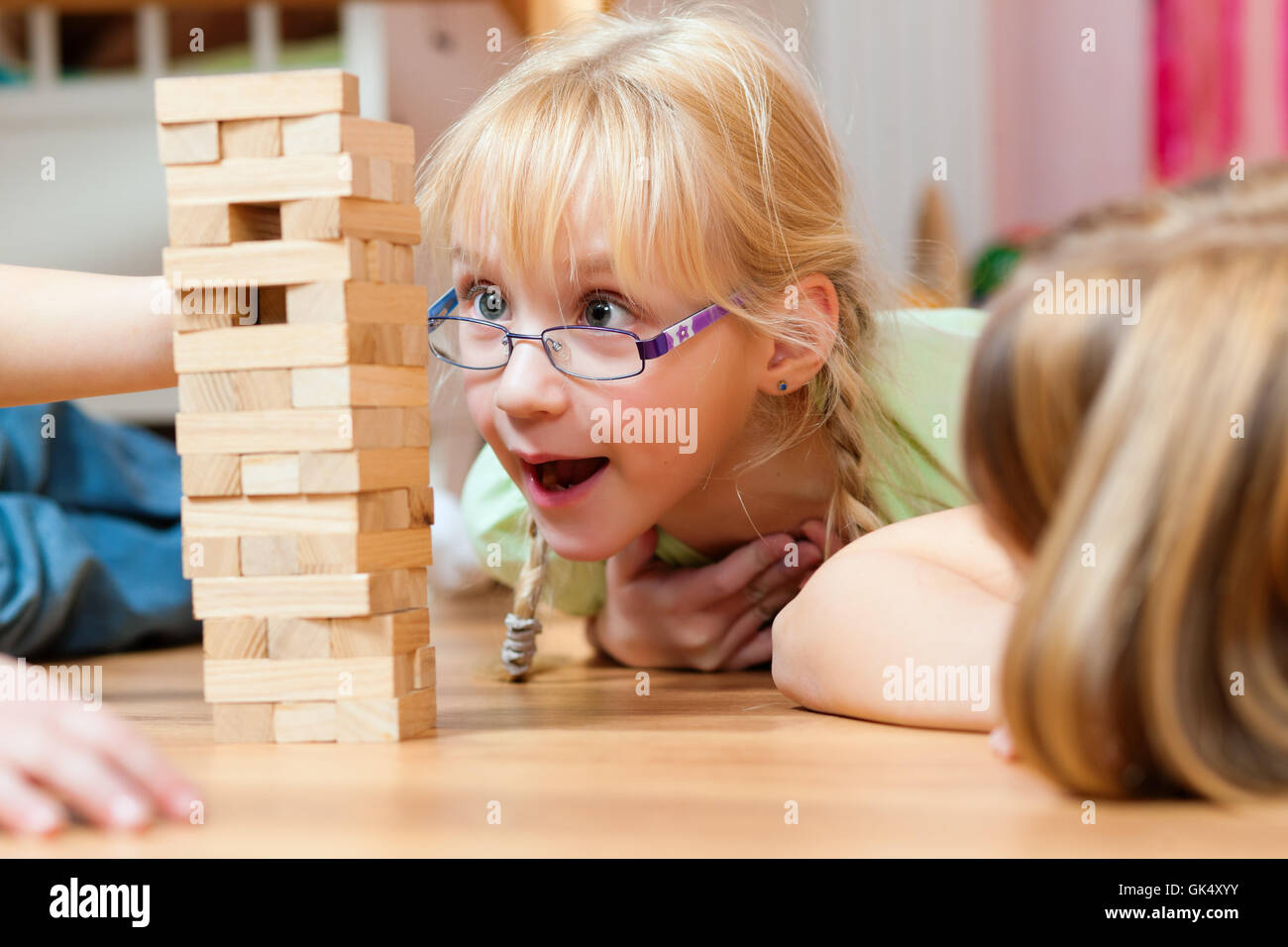 children playing at home Stock Photo - Alamy