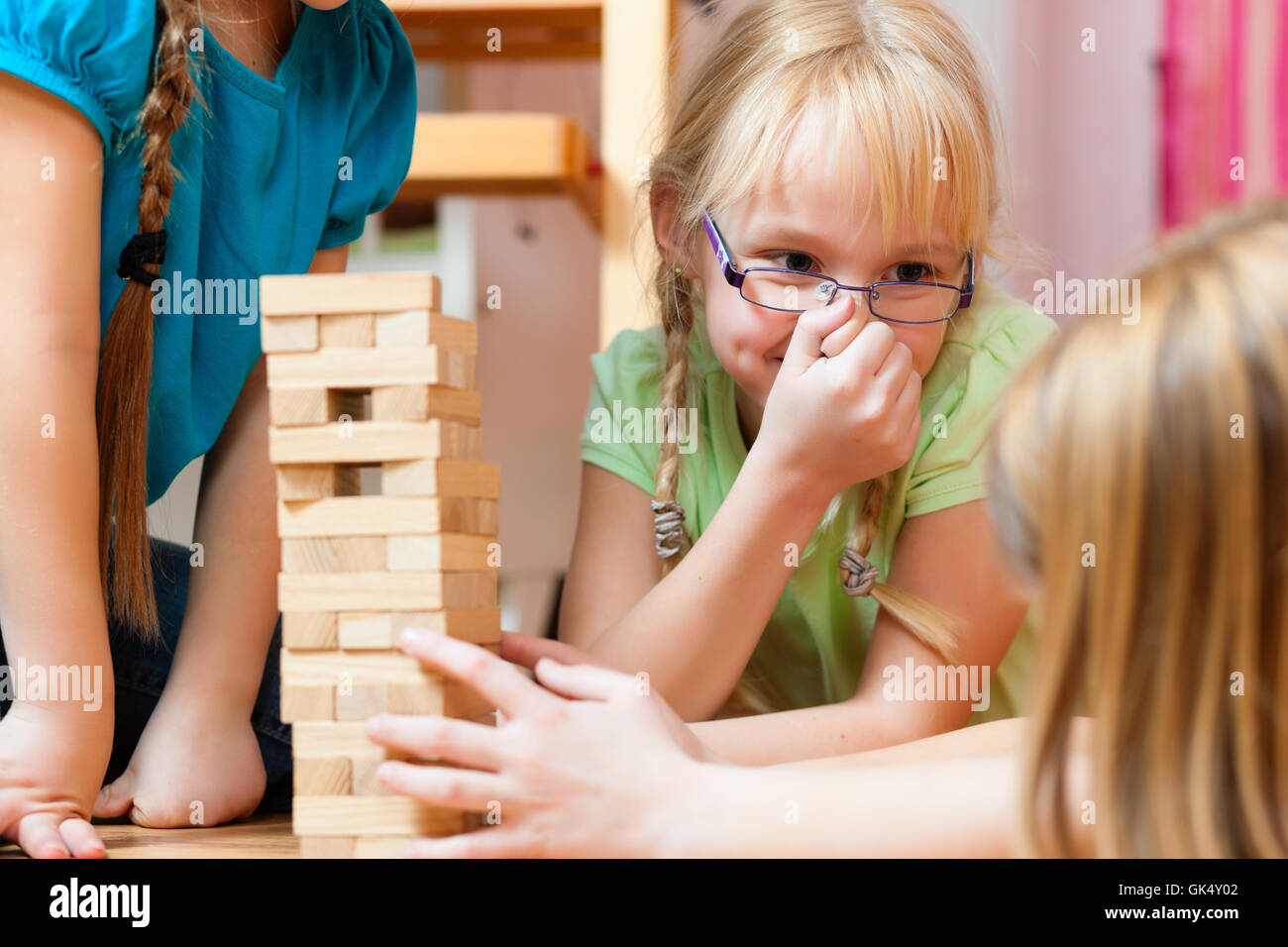 children playing at home Stock Photo - Alamy