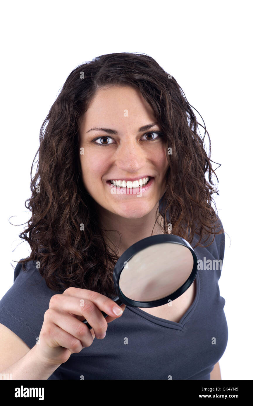 woman with magnifying glass in front of face Stock Photo - Alamy
