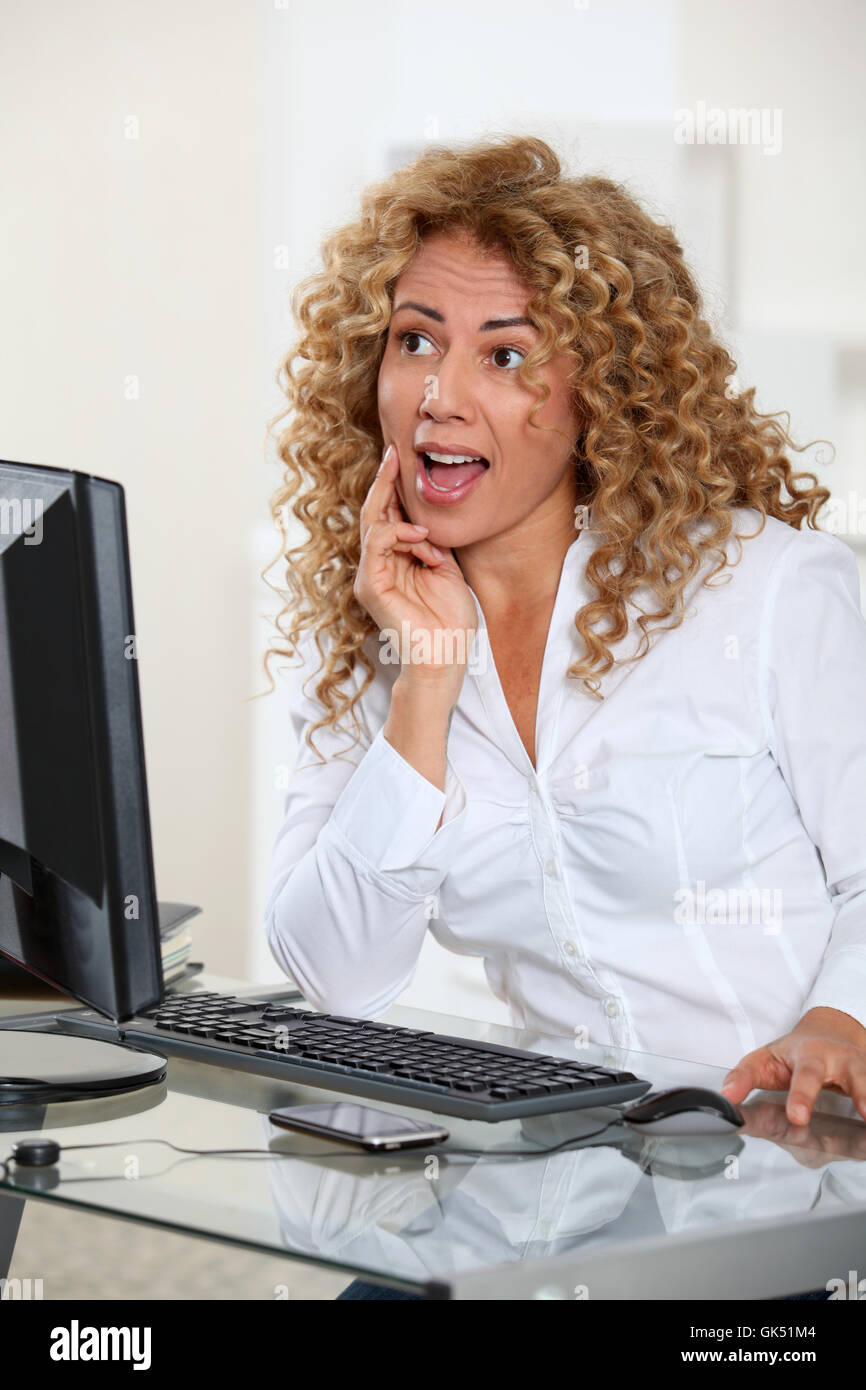 Shocked surprise beautiful woman office hi-res stock photography and ...