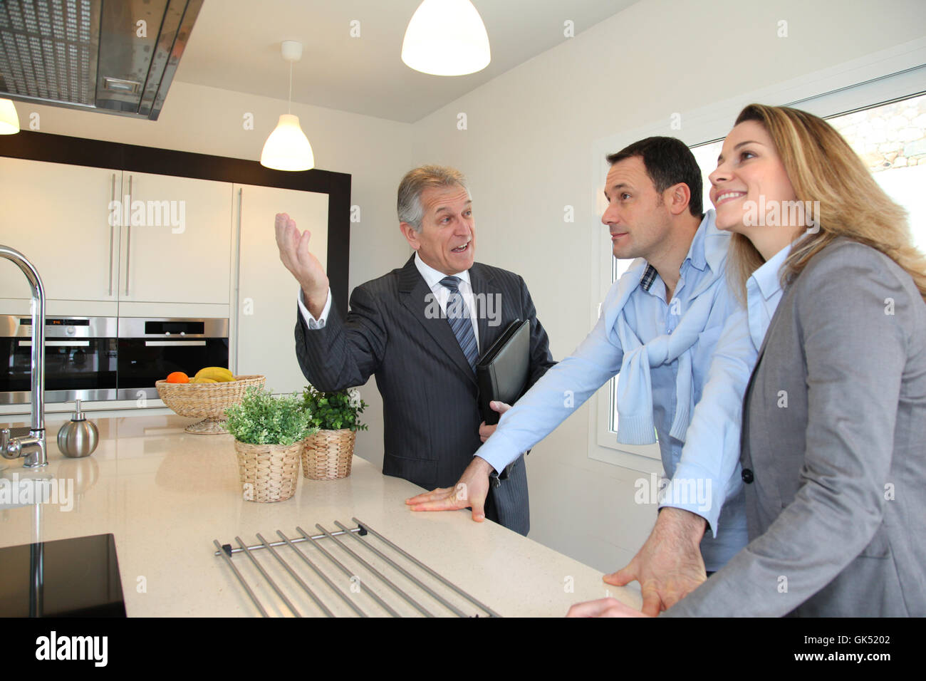 woman house building Stock Photo - Alamy