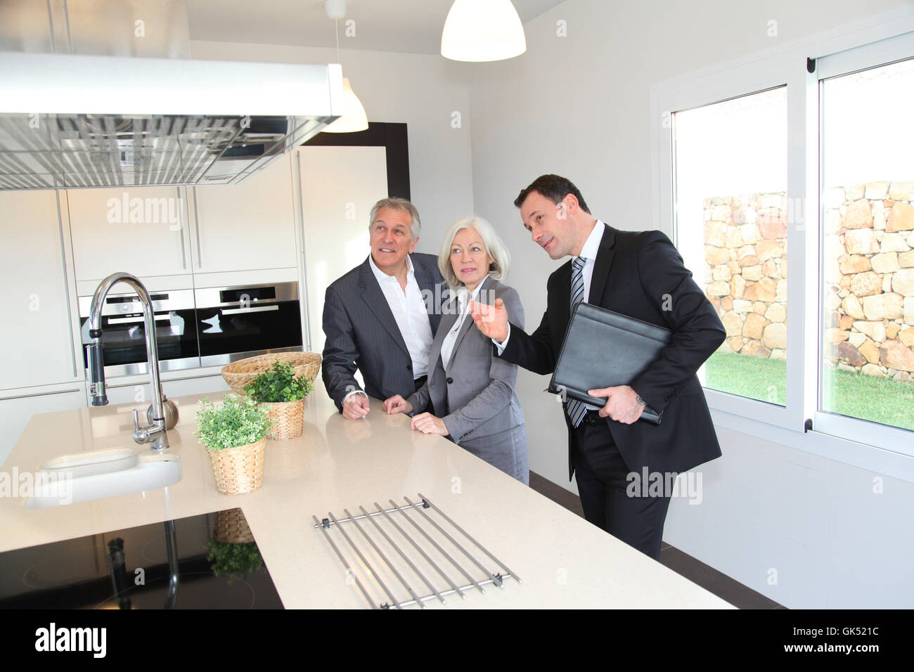 woman house building Stock Photo - Alamy