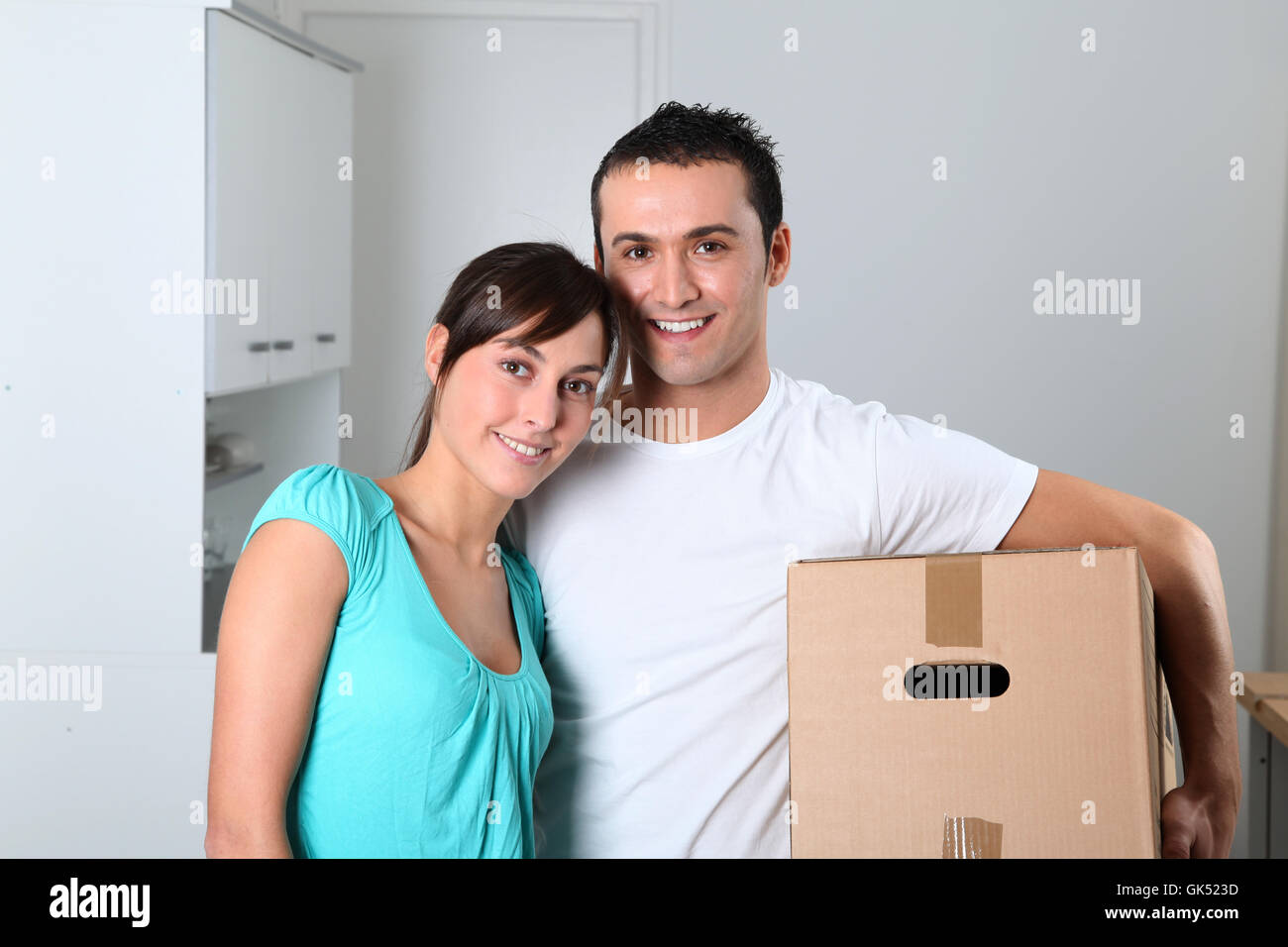 woman house building Stock Photo - Alamy