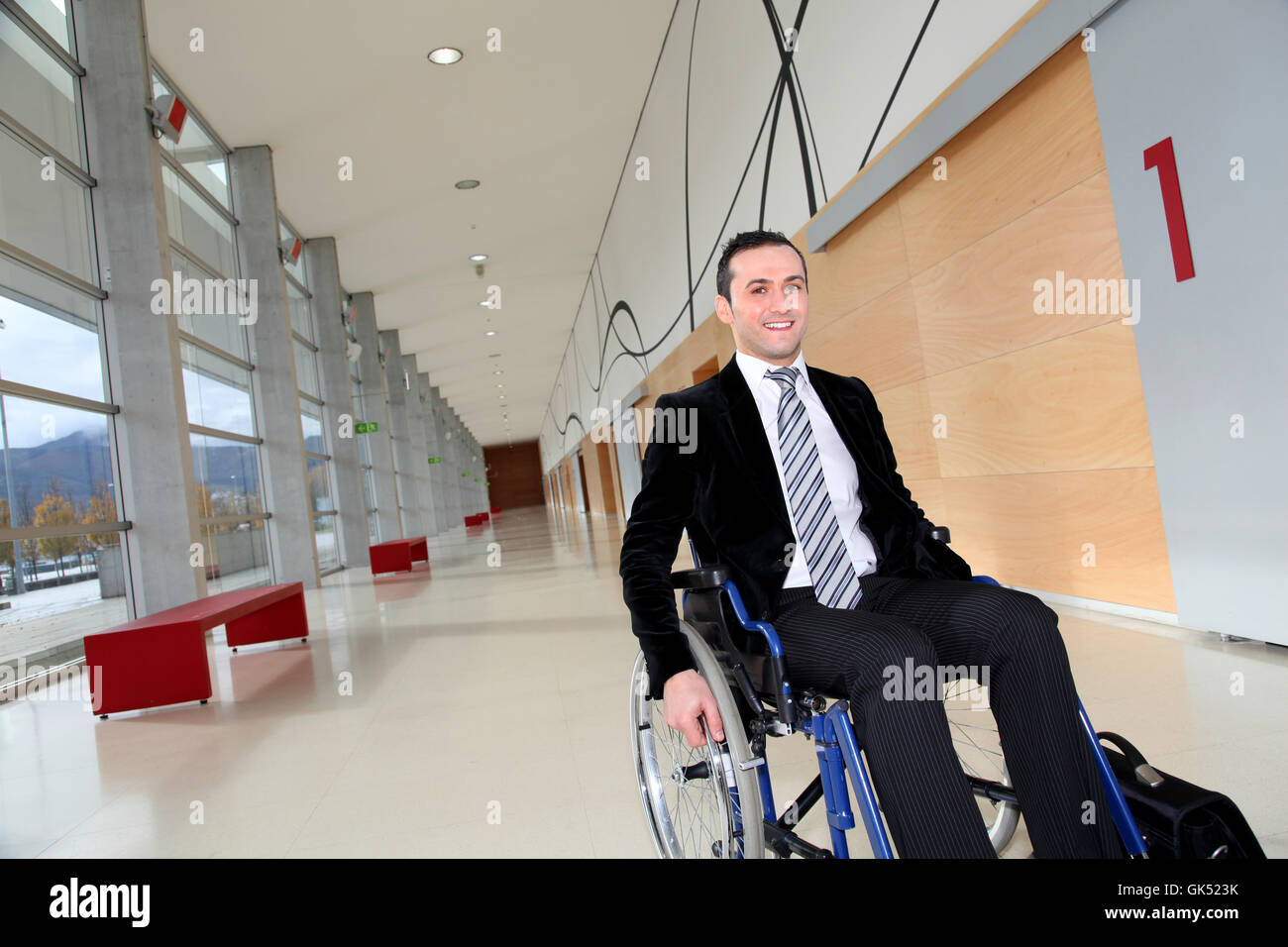 hall wheelchair office Stock Photo - Alamy