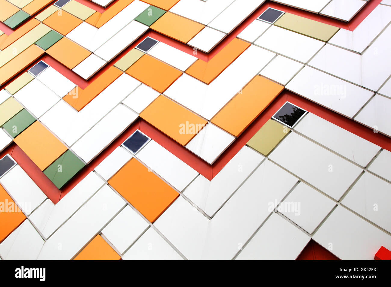 on the wall of multi-colored ceramic tiles Stock Photo - Alamy