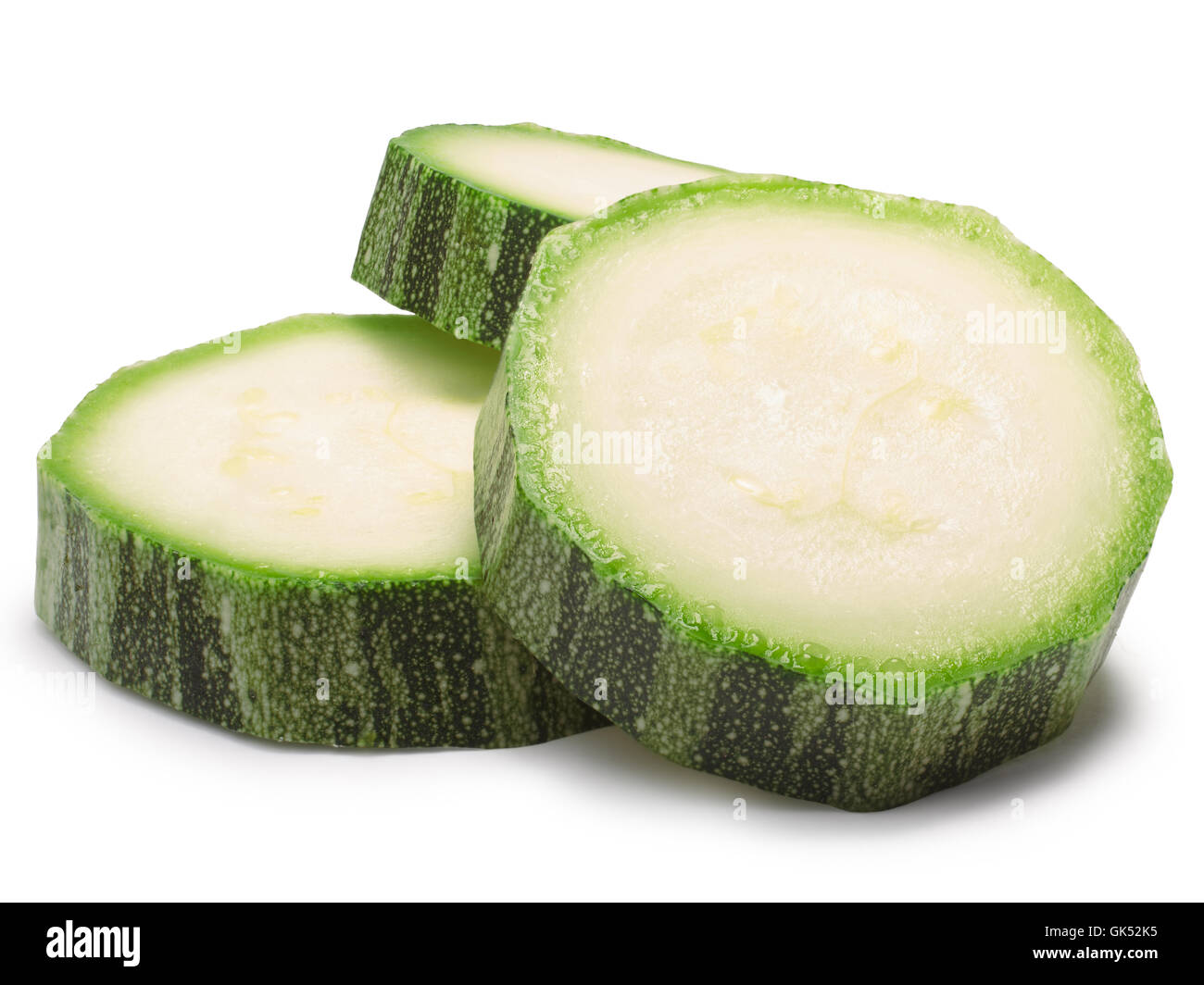 Sliced striped zucchini (Cucurbita Pepo). Clipping paths, shadows ...