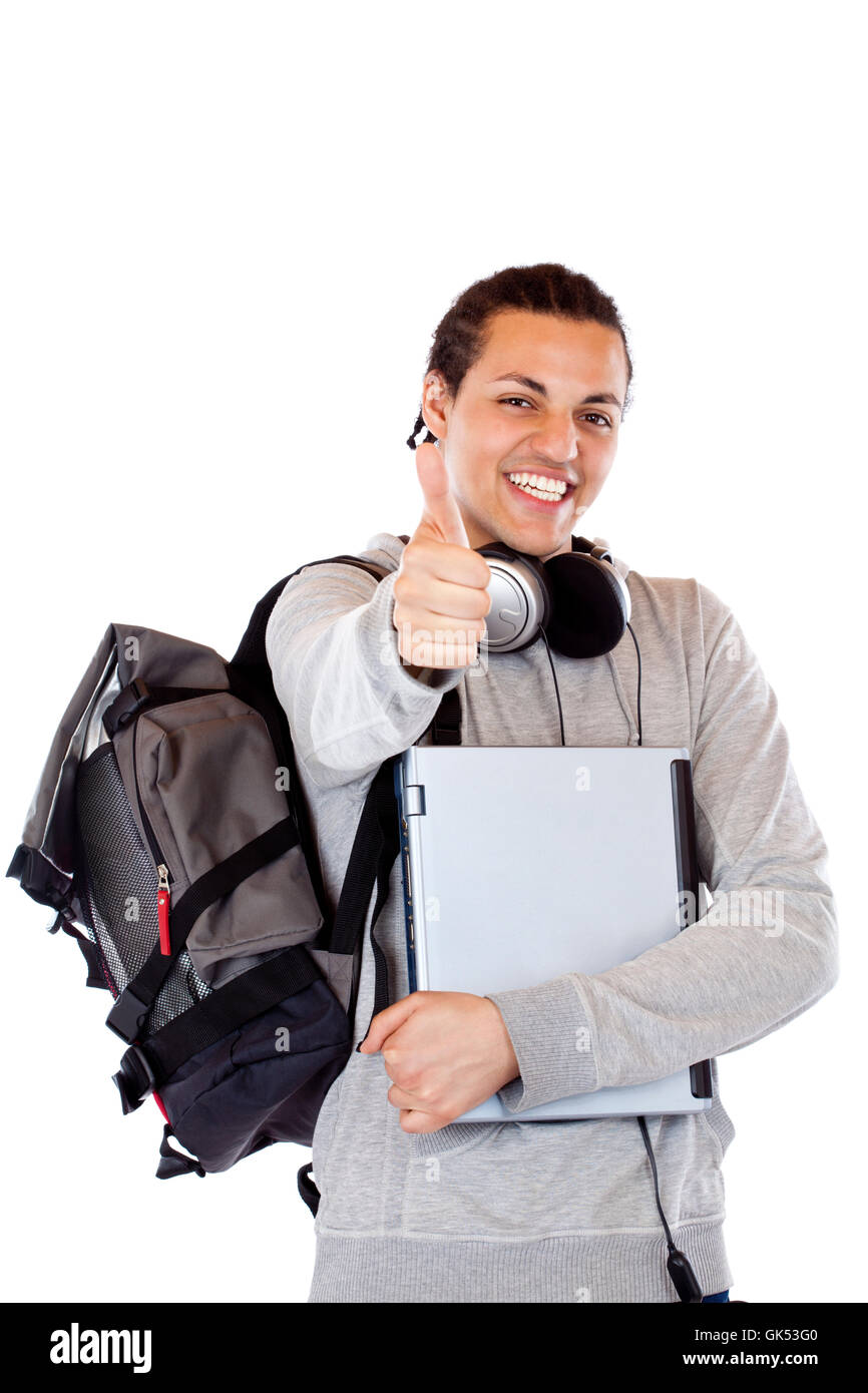 student with laptop holding thumbs up Stock Photo - Alamy