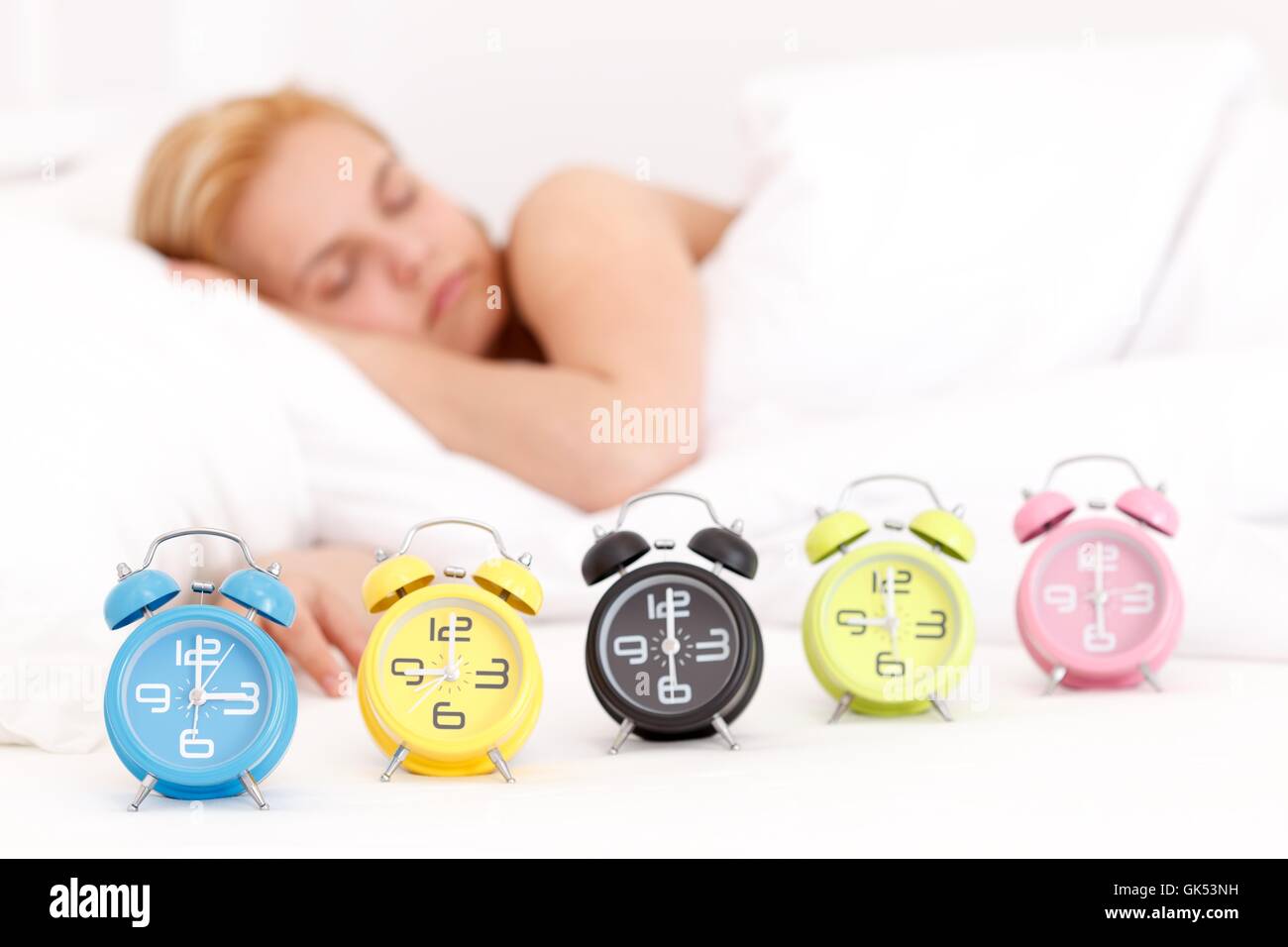 bed clock sleep Stock Photo - Alamy
