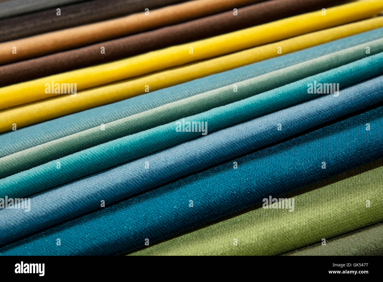 Colorful multicolored fabric samples swatch in textile catalogue ...