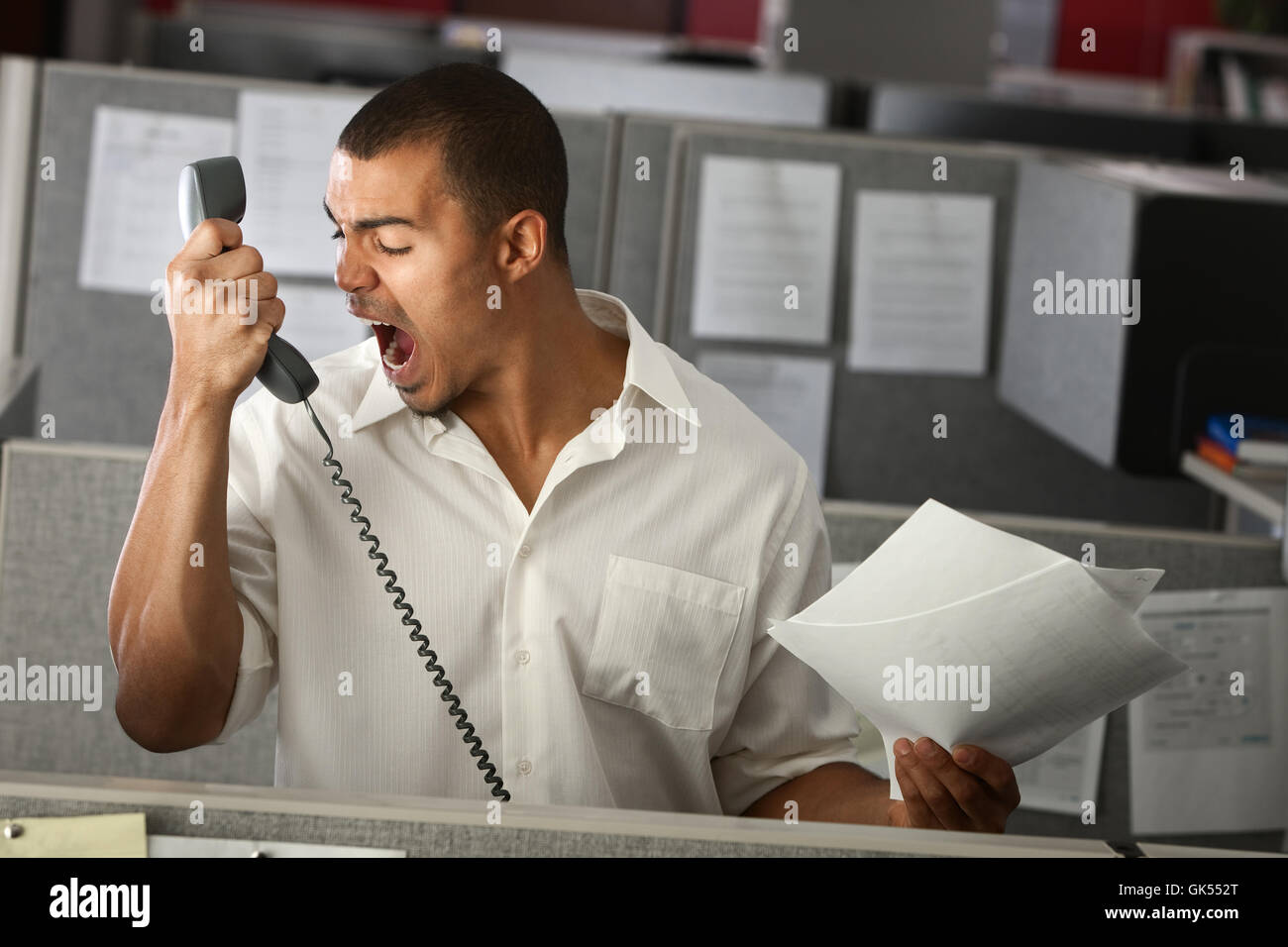 Angry employee at cubicle hi-res stock photography and images - Alamy