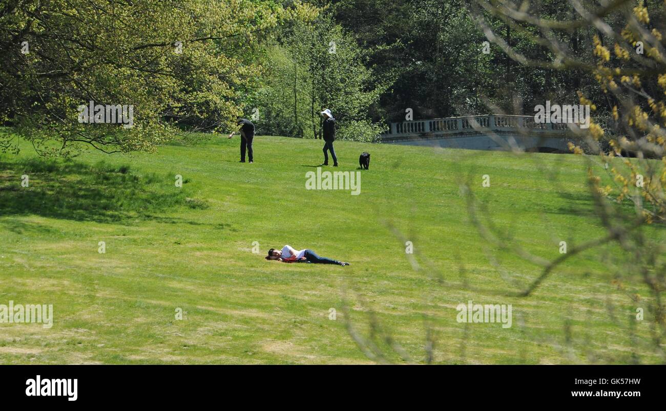 People enjoying the warm spring sunshine on Hampstead Heath Featuring ...