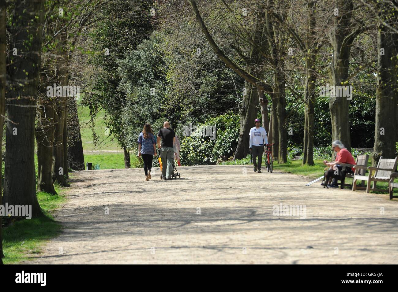 People enjoying the warm spring sunshine on Hampstead Heath Featuring ...