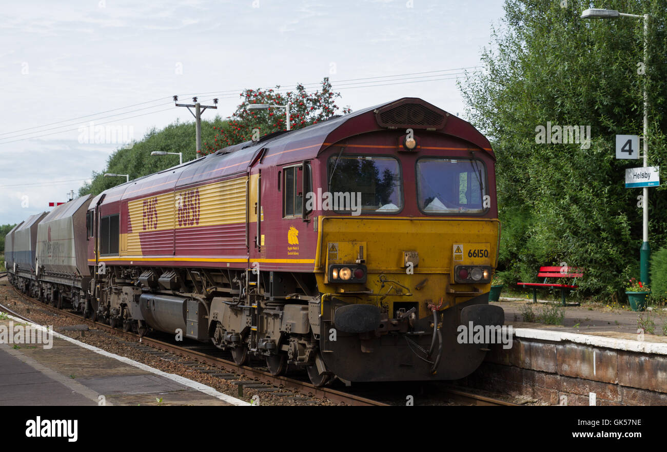 DB Cargo Class 66 Diesel locomotive working a train of empty hopper ...