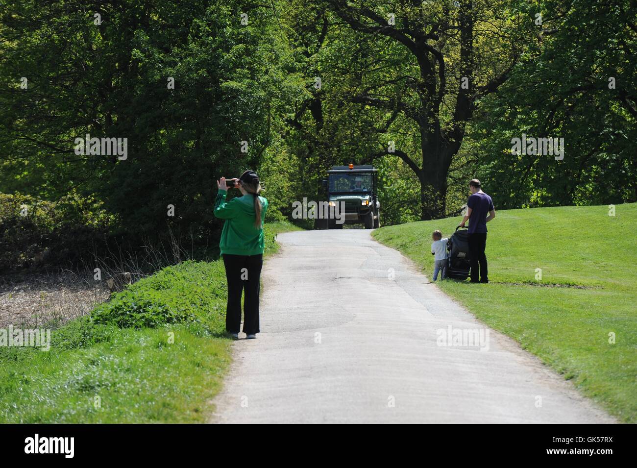 People enjoying the warm spring sunshine on Hampstead Heath Featuring ...