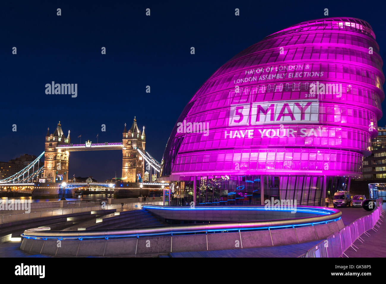 London's City Hall is lit up in pink, the colour of the Mayor of London ...