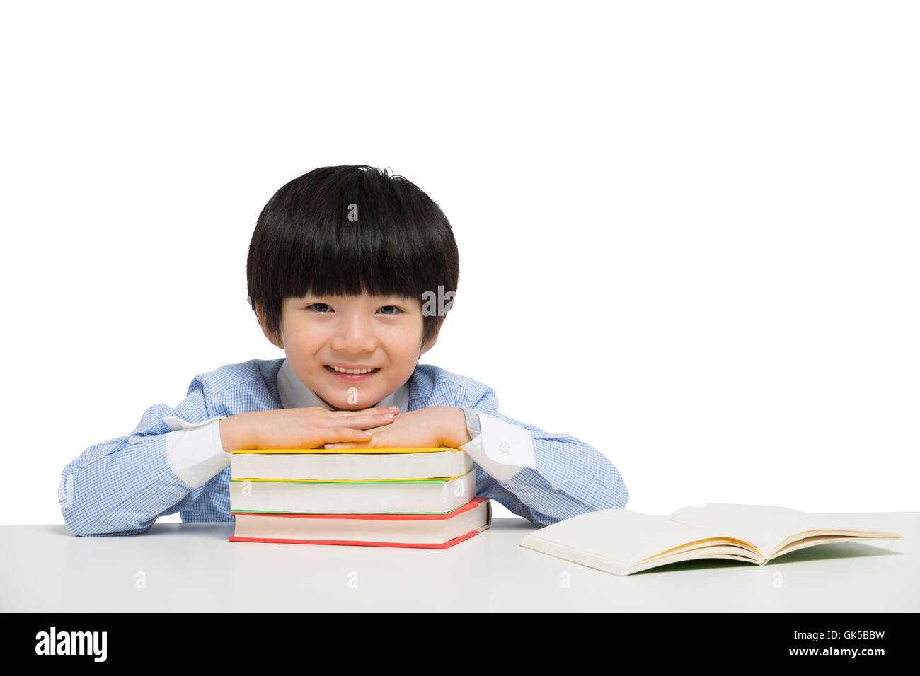 Little boy lying on the desk to sleep Stock Photo - Alamy