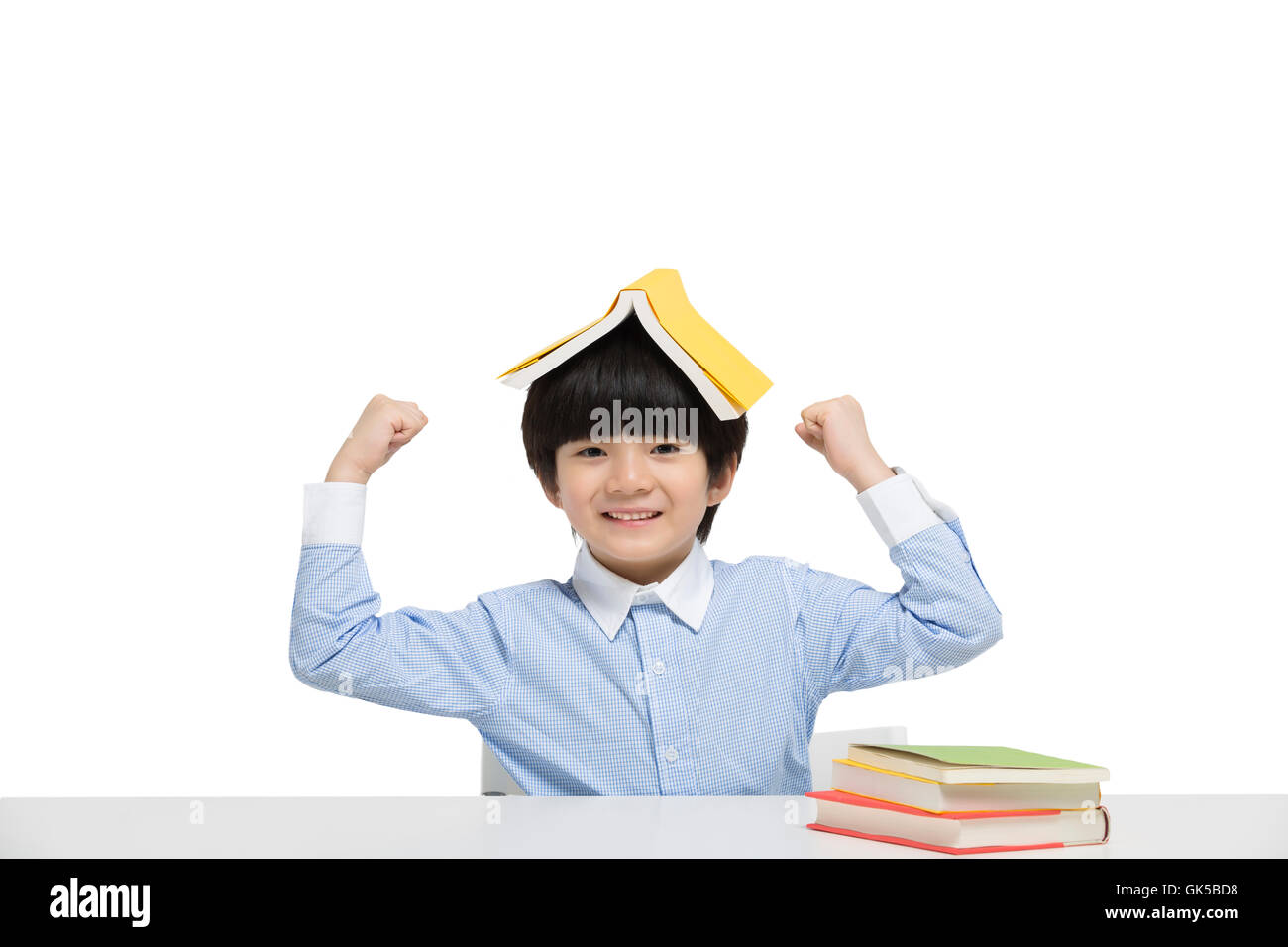 Little boy playing at the desk Stock Photo - Alamy