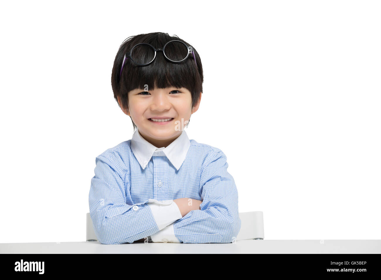 The little boy in the front desk Stock Photo - Alamy