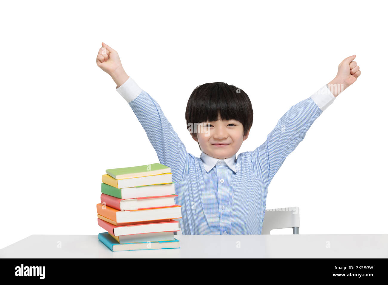 Little boy playing at the desk Stock Photo - Alamy