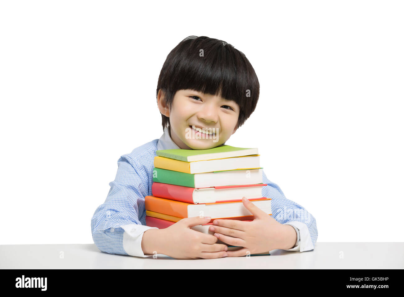 Little boy playing at the desk Stock Photo - Alamy