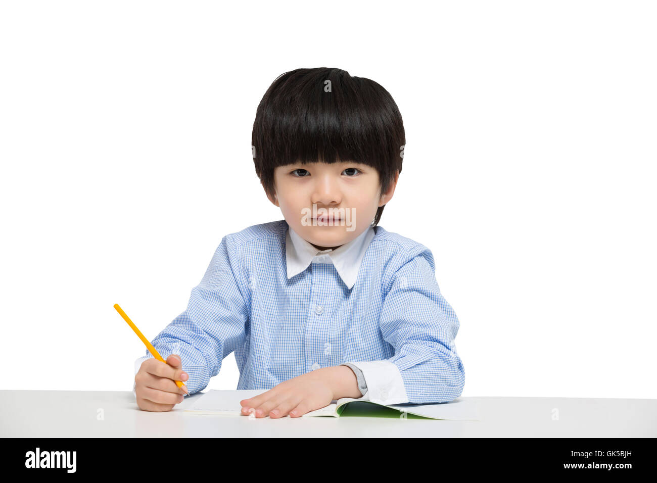 The little boy was writing Stock Photo - Alamy