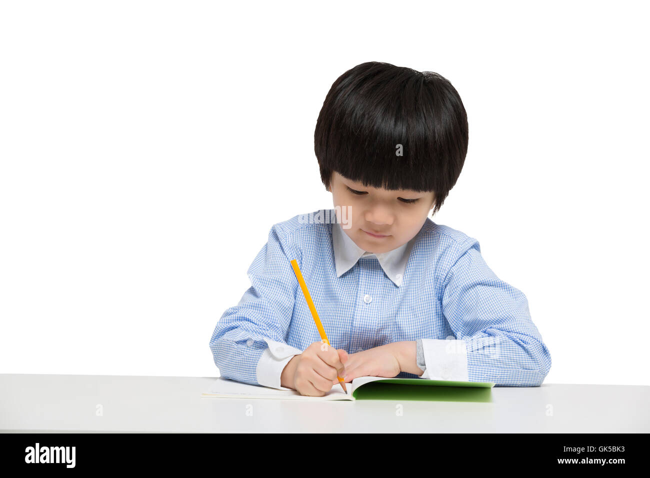 The little boy was writing Stock Photo - Alamy