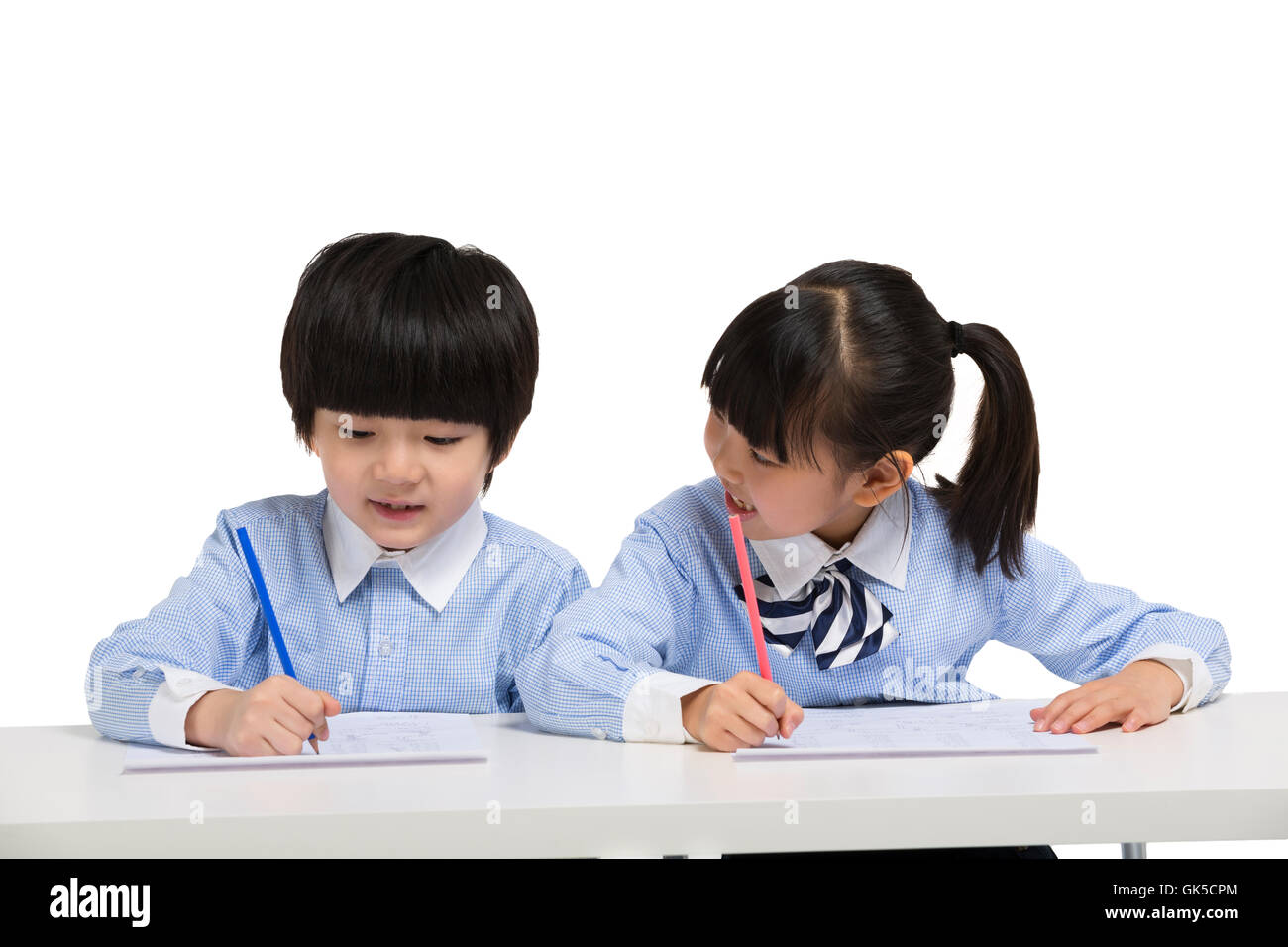 The little boy and the little girl in the study Stock Photo - Alamy