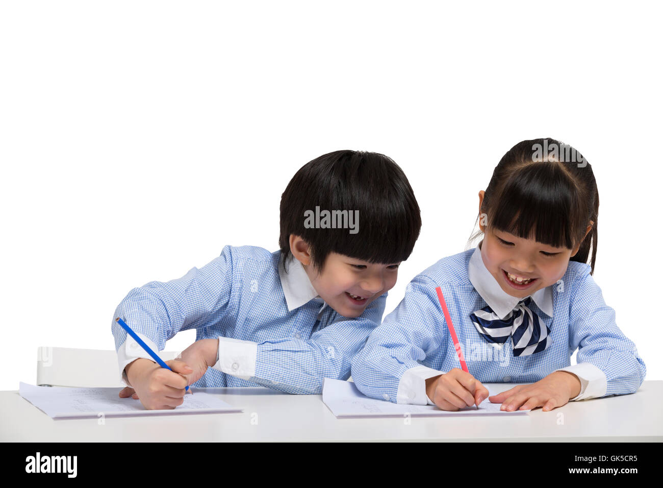 The little boy and the little girl in the study Stock Photo - Alamy