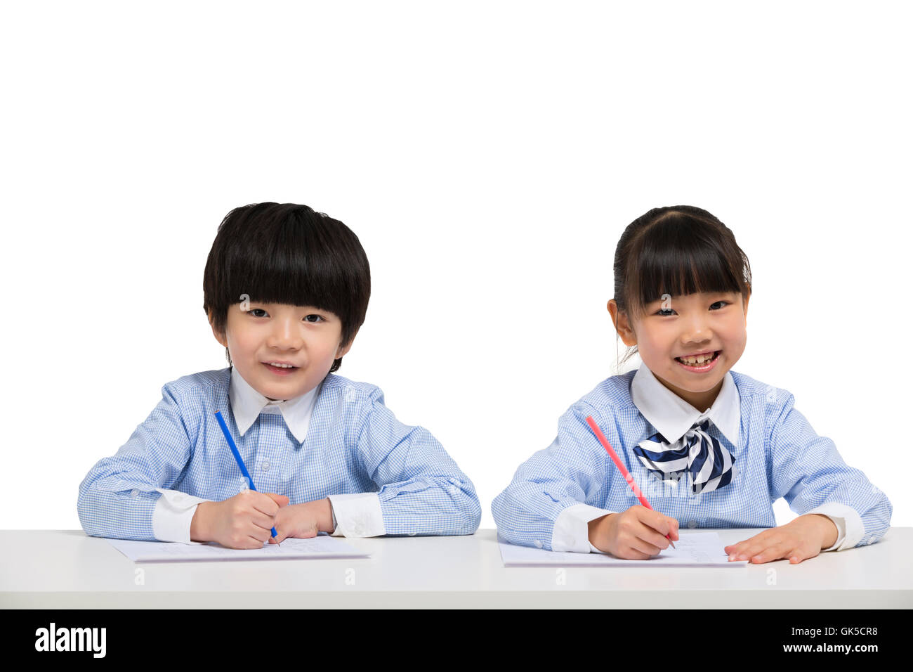 The little boy and the little girl in the study Stock Photo - Alamy