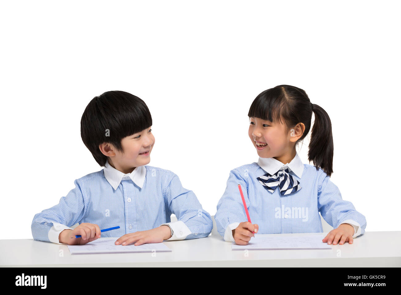 The little boy and the little girl in the study Stock Photo - Alamy