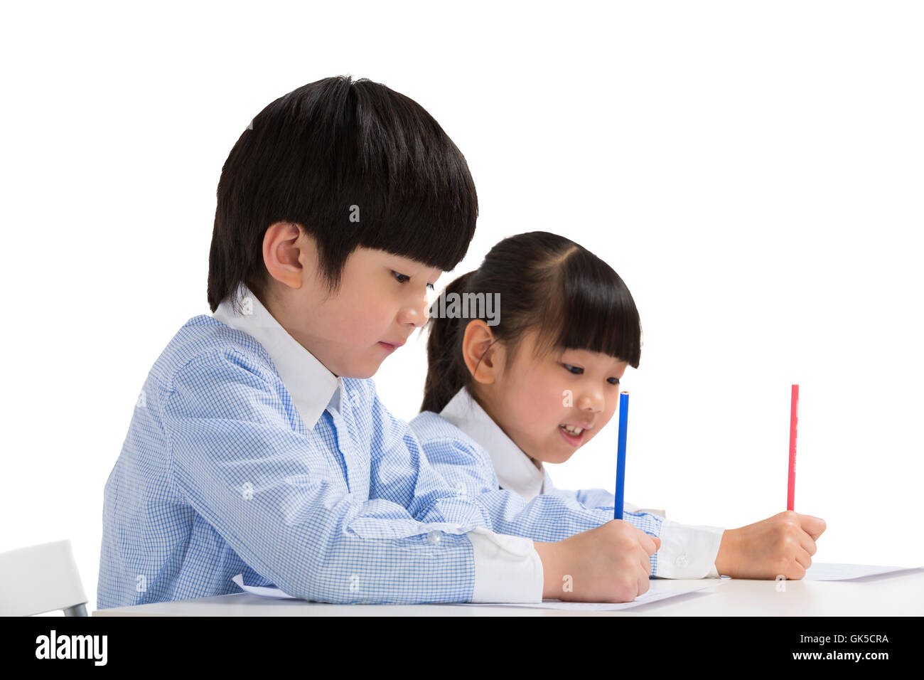 The little boy and the little girl in the study Stock Photo - Alamy