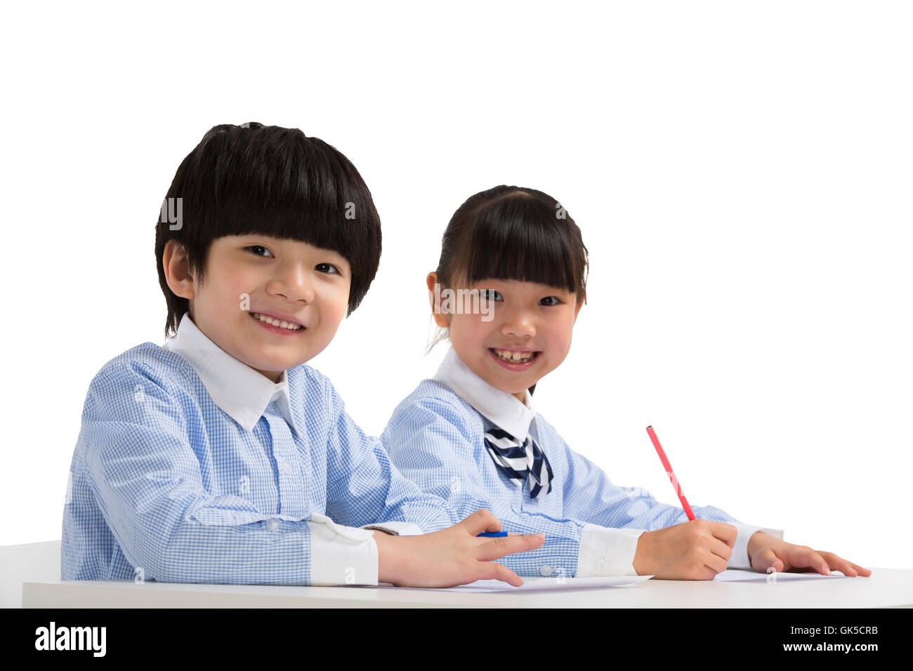 The little boy and the little girl in the study Stock Photo - Alamy