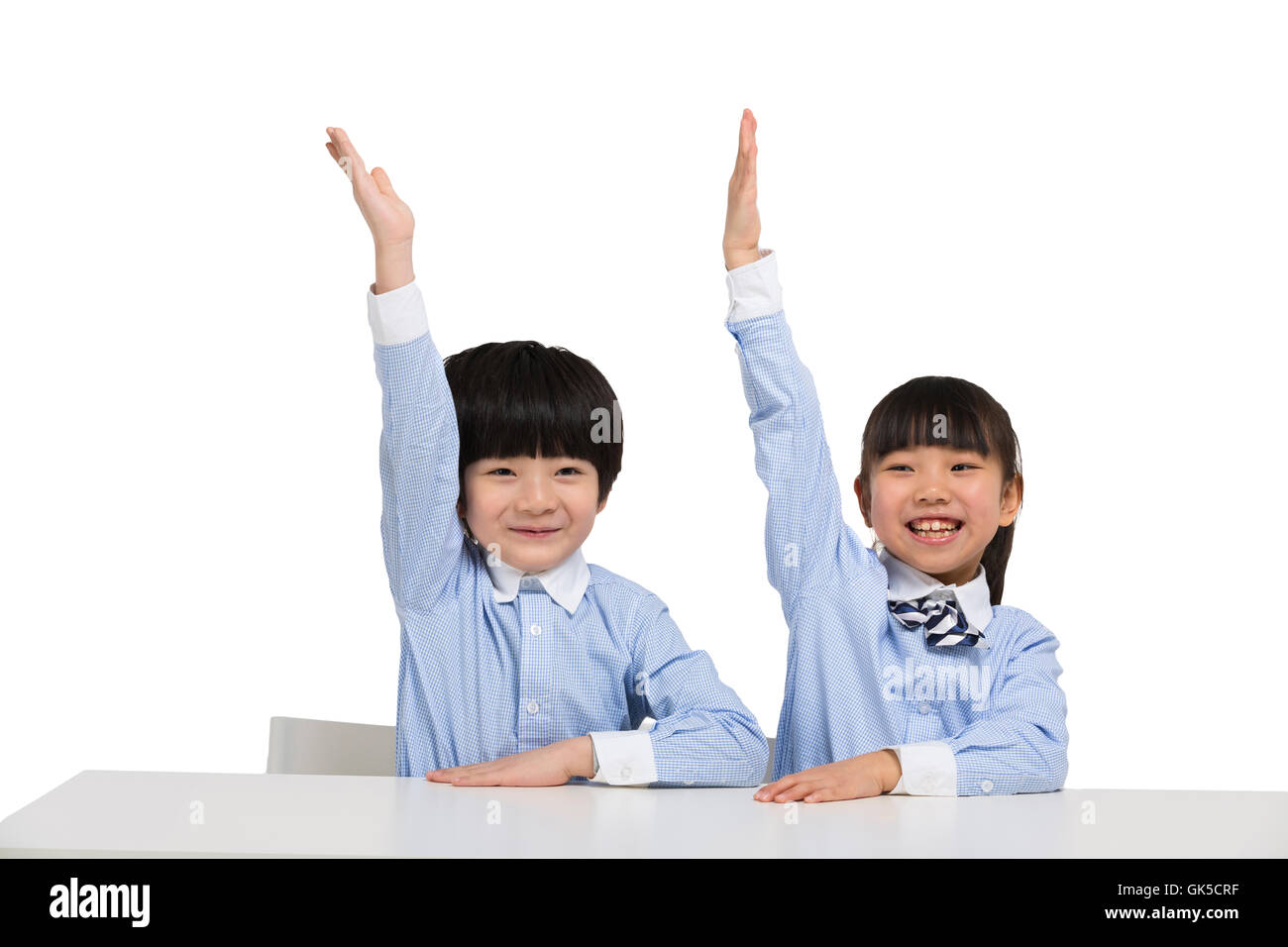 Little boys and little girls raised their hands to answer questions ...