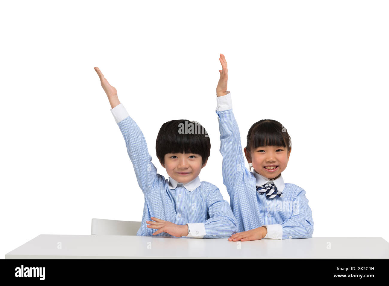 Little boys and little girls raised their hands to answer questions ...