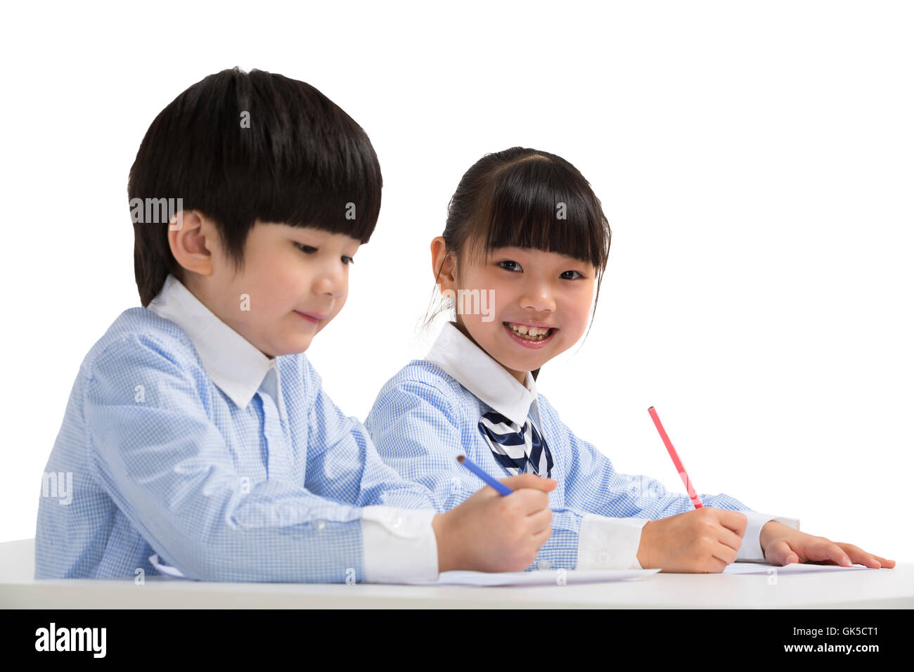 The little boy and the little girl in the study Stock Photo - Alamy