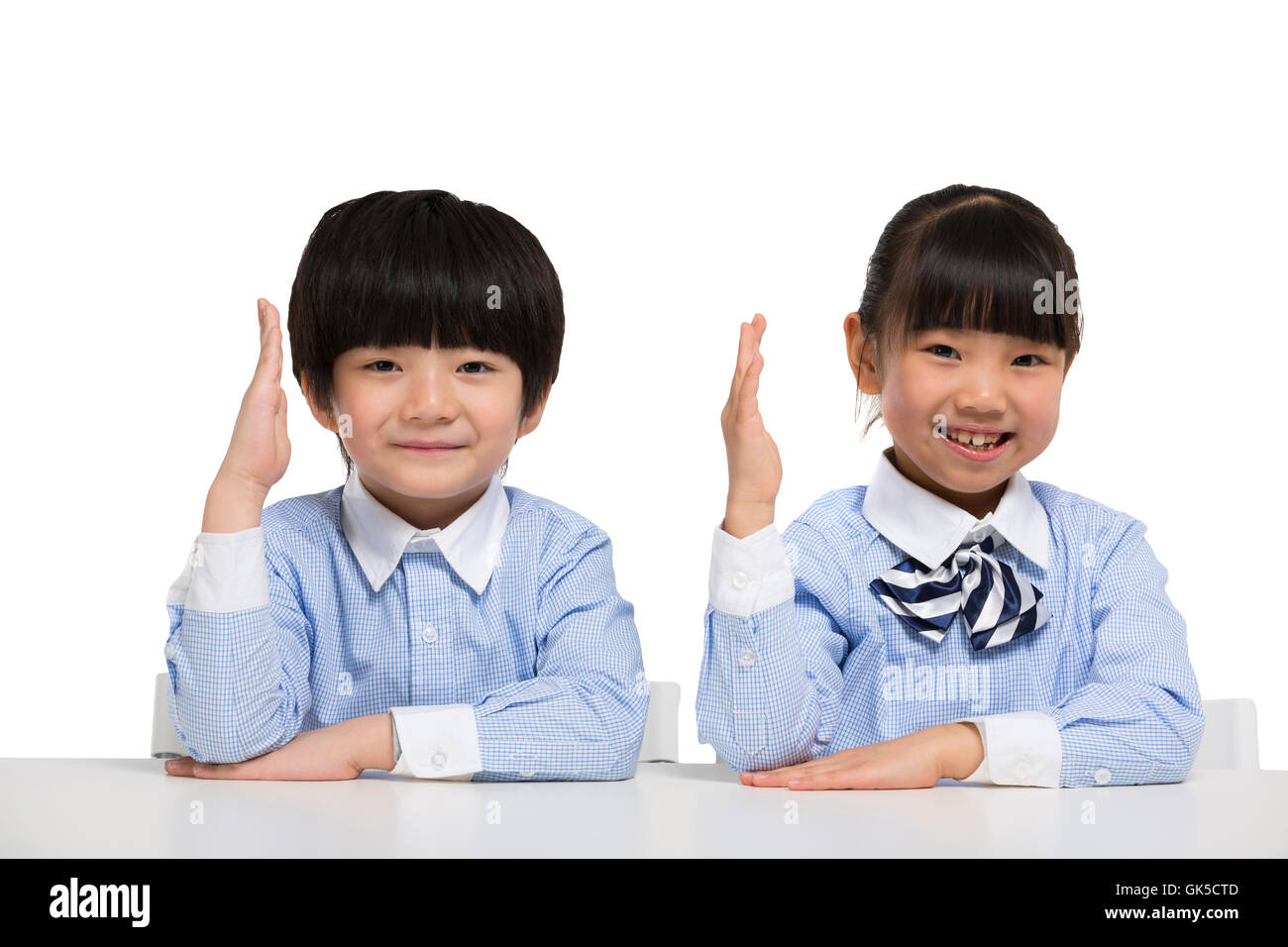 Little boys and little girls raised their hands to answer questions ...