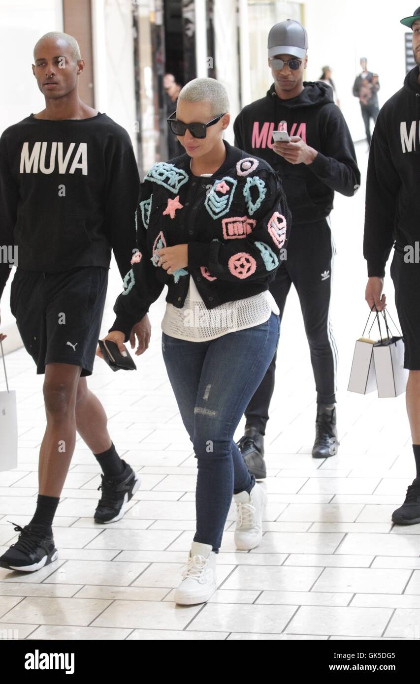 Amber Rose goes shopping at the Beverly Center with a posse of men ...