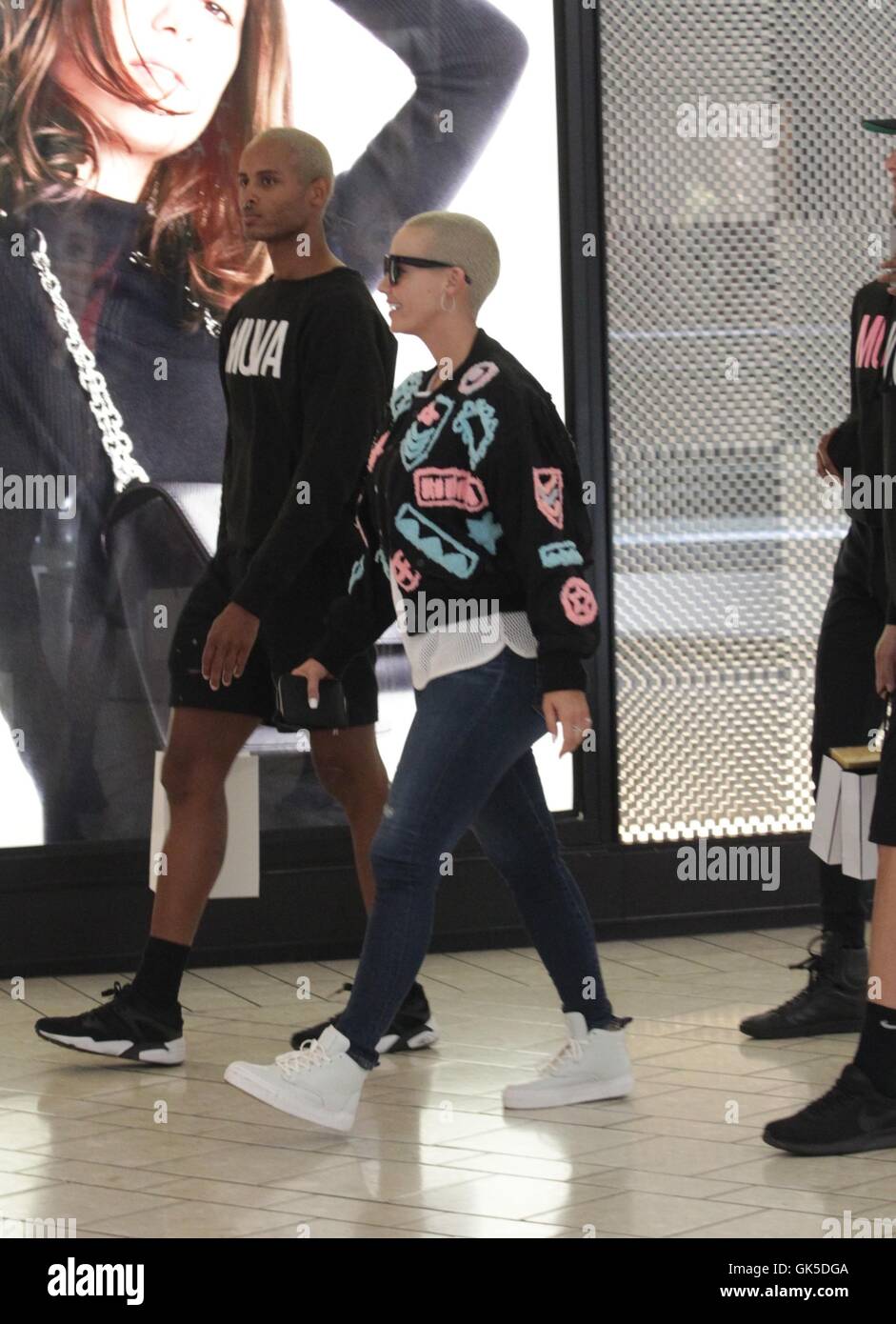 Amber Rose goes shopping at the Beverly Center with a posse of men ...