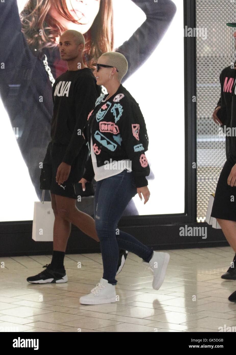 Amber Rose goes shopping at the Beverly Center with a posse of men ...
