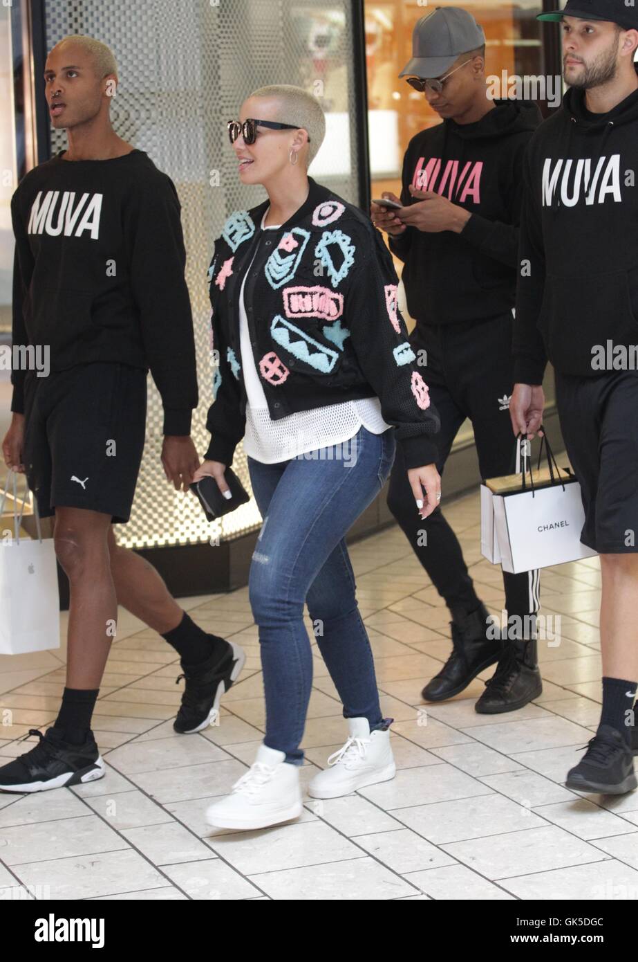 Amber Rose goes shopping at the Beverly Center with a posse of men ...