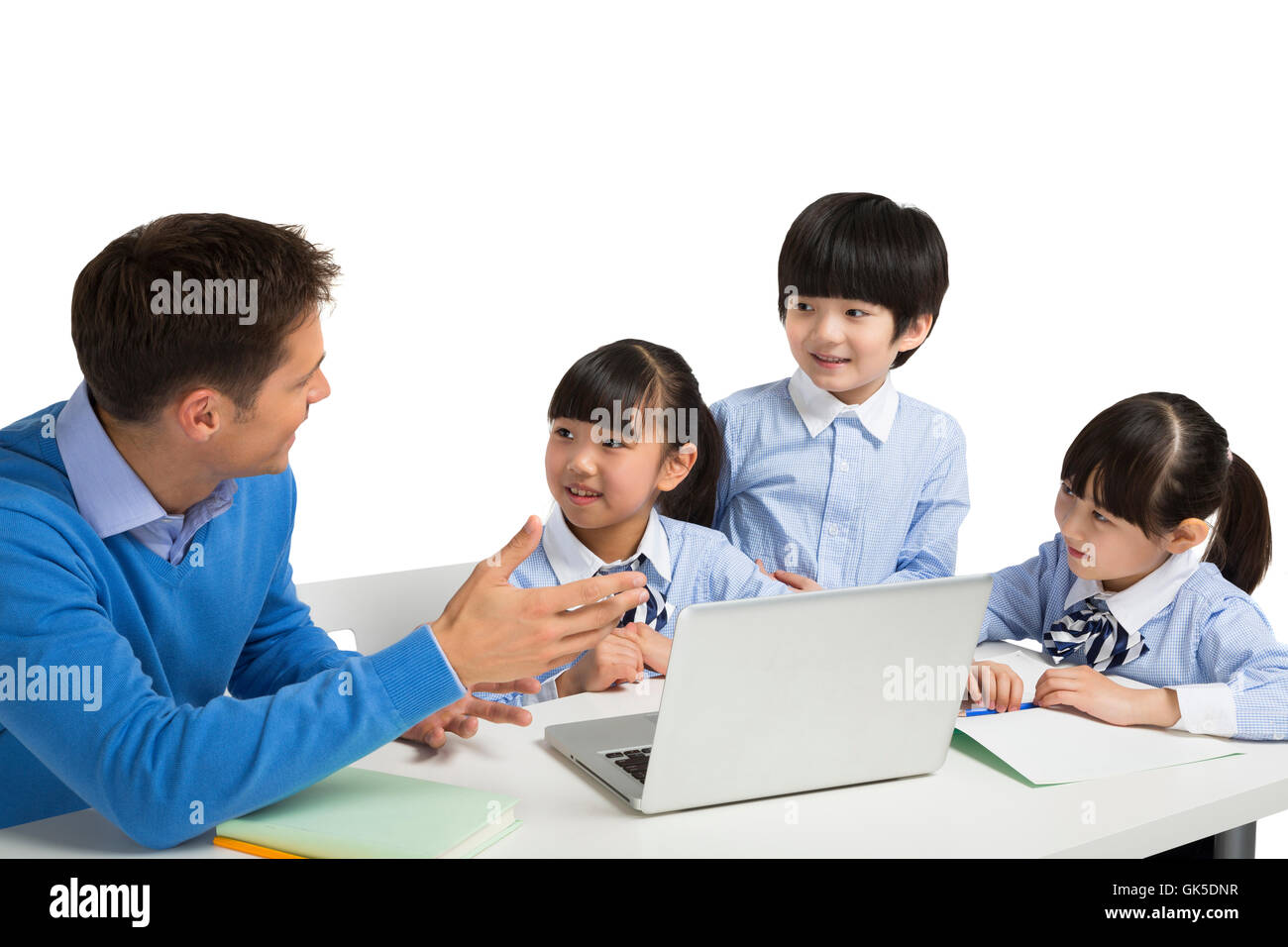 Male teacher and children Stock Photo - Alamy