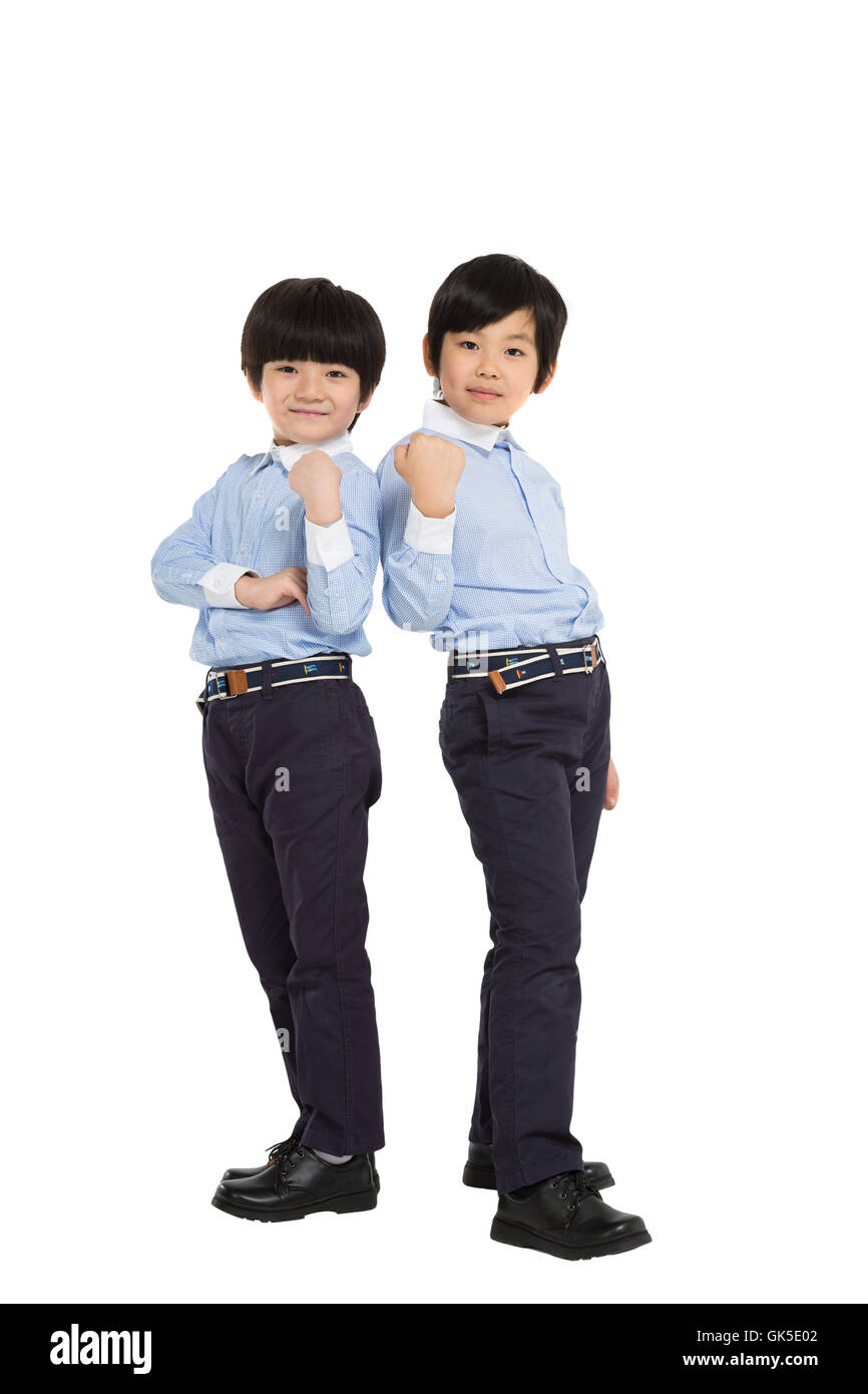 Children back to back station Stock Photo - Alamy